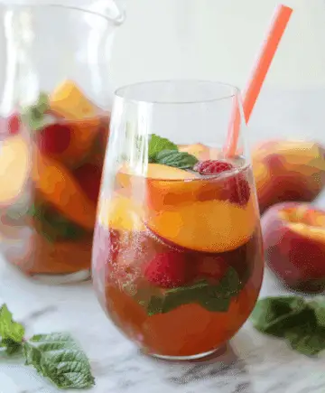 Bellini Peach Raspberry Iced Tea Recipe - cookingwithjessica.com